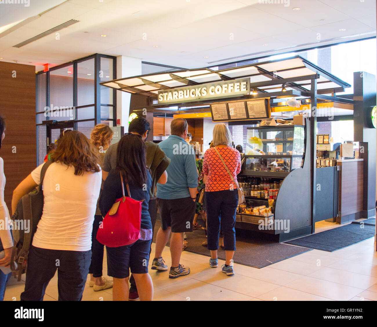 Starbucks coffee line of people Stock Photo - Alamy