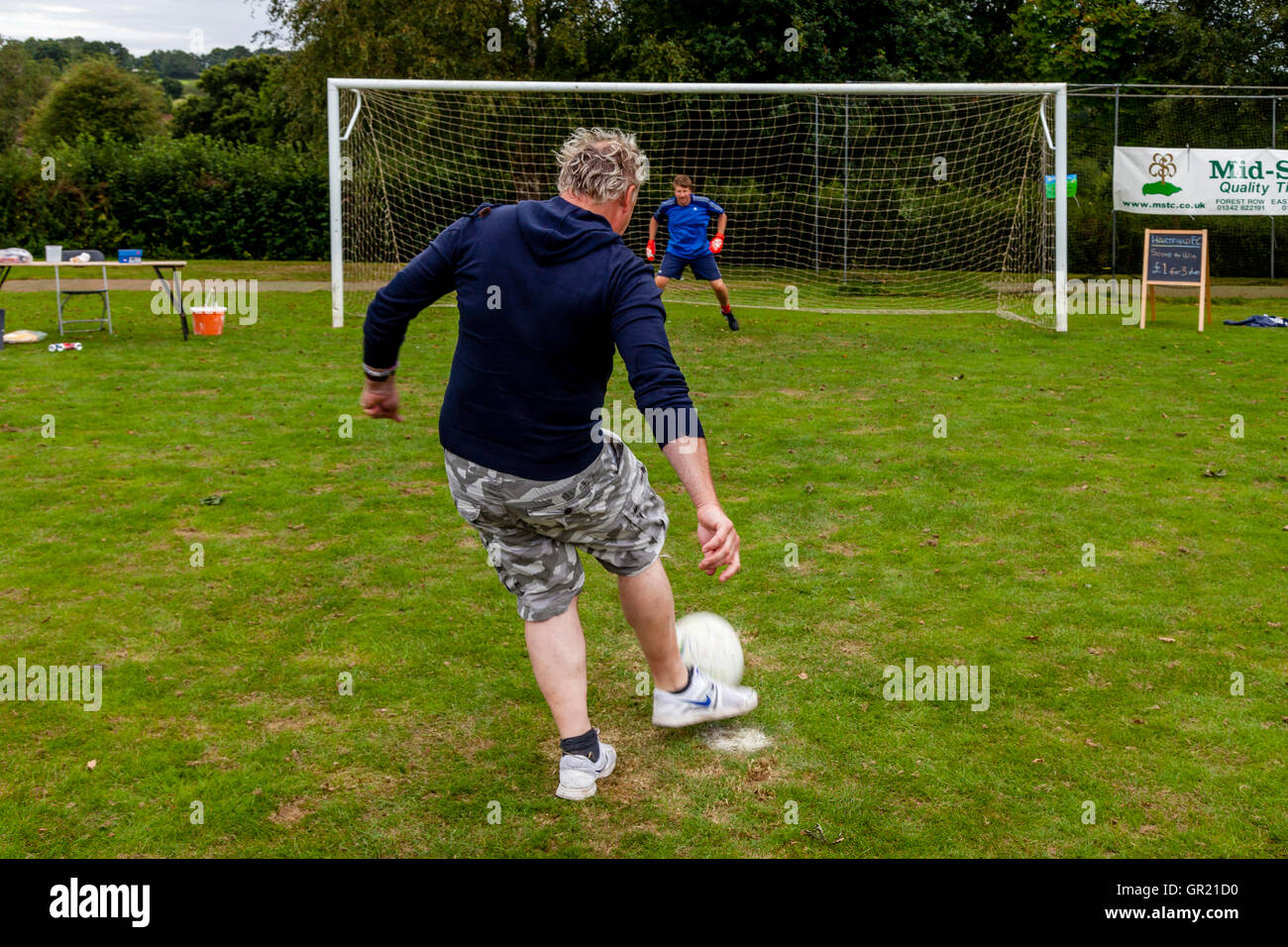 Football challenge man hi-res stock photography and images - Alamy