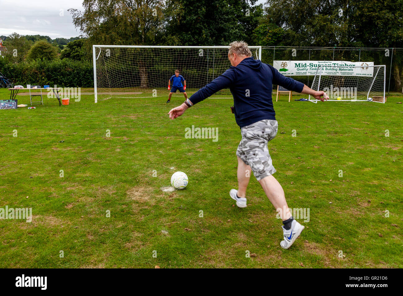 Football challenge man hi-res stock photography and images - Alamy