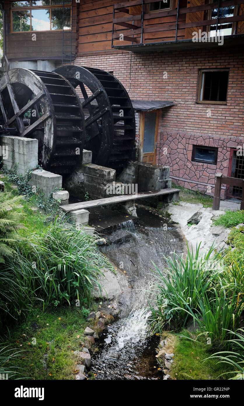 Wooden spinning wheel rotating and working, Zwierzyniec,Roztocze,Poland ...