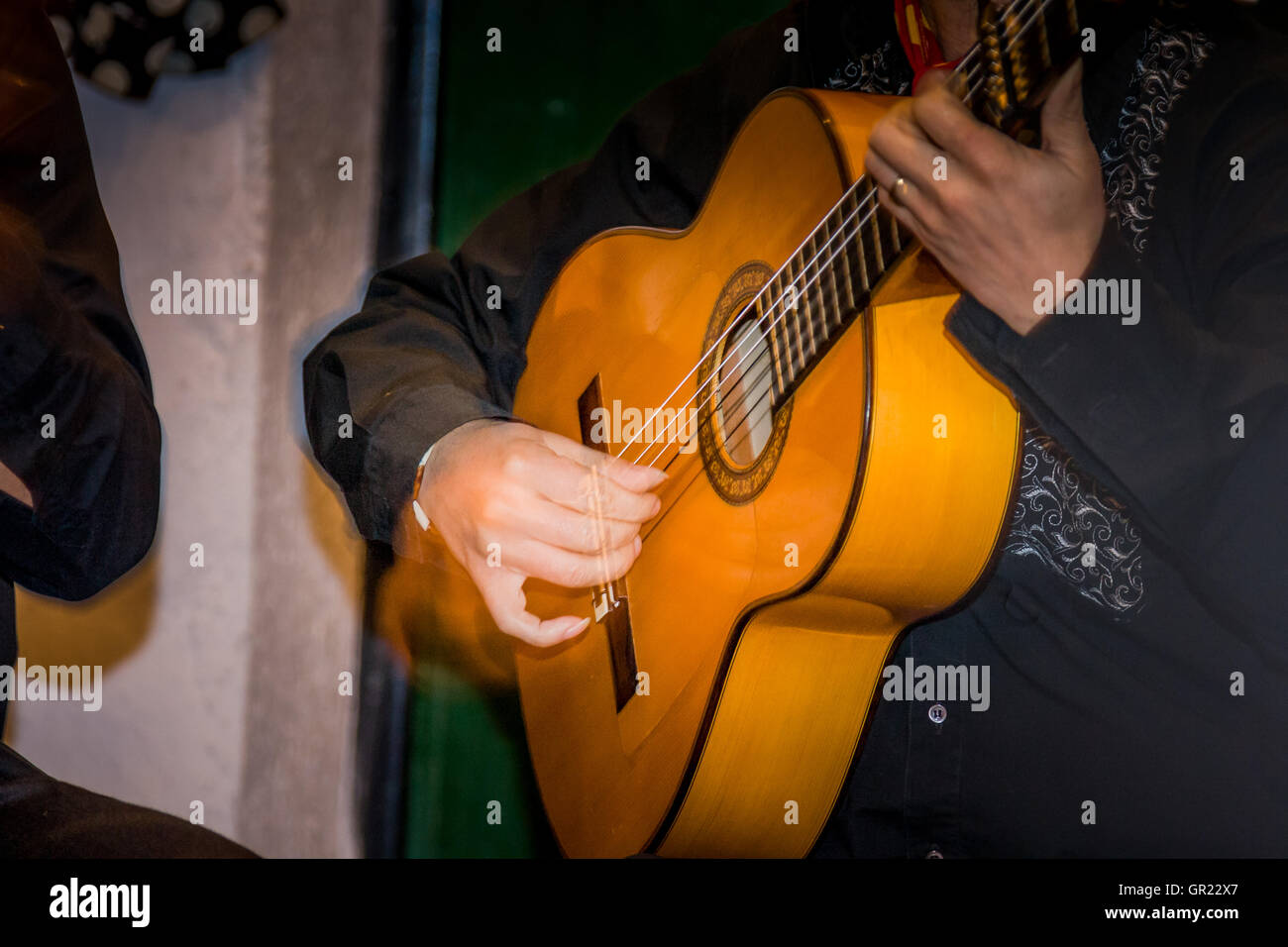 Granada, Spain - March 24, 2008 - Man playing the Spanish guitar in ...