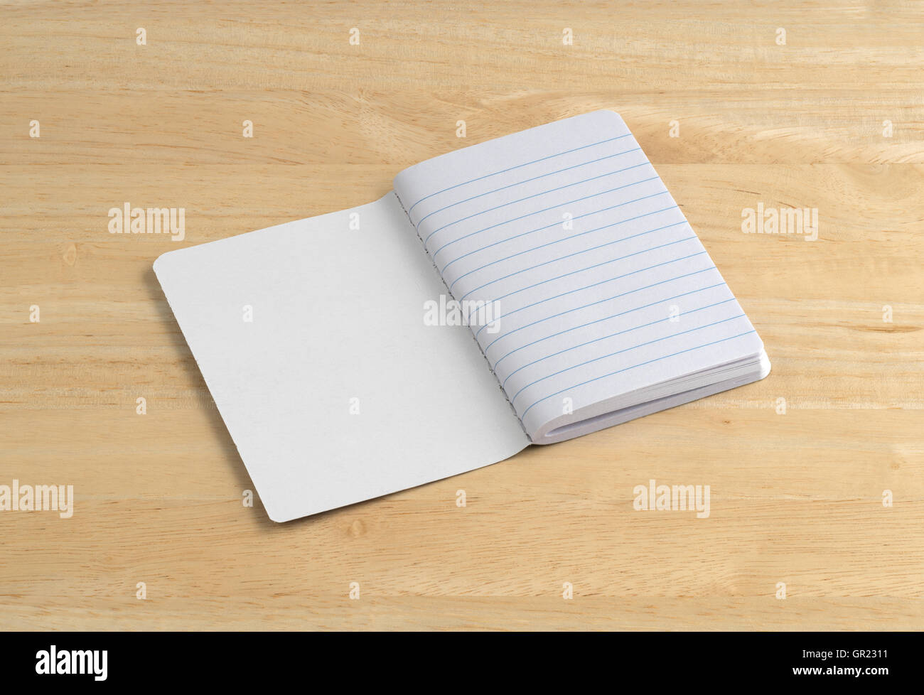 An opened blank notebook on a wood table Stock Photo - Alamy
