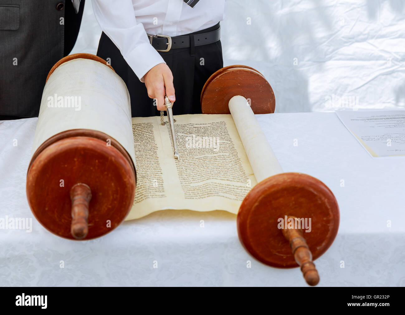 Hand of boy reading the Jewish Torah at Bar Mitzvah Bar Mitzvah Torah ...
