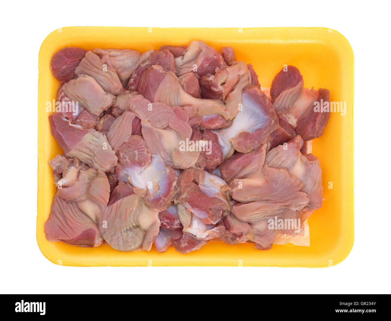 Top view of fresh chicken gizzards and hearts in a yellow foam butchers ...