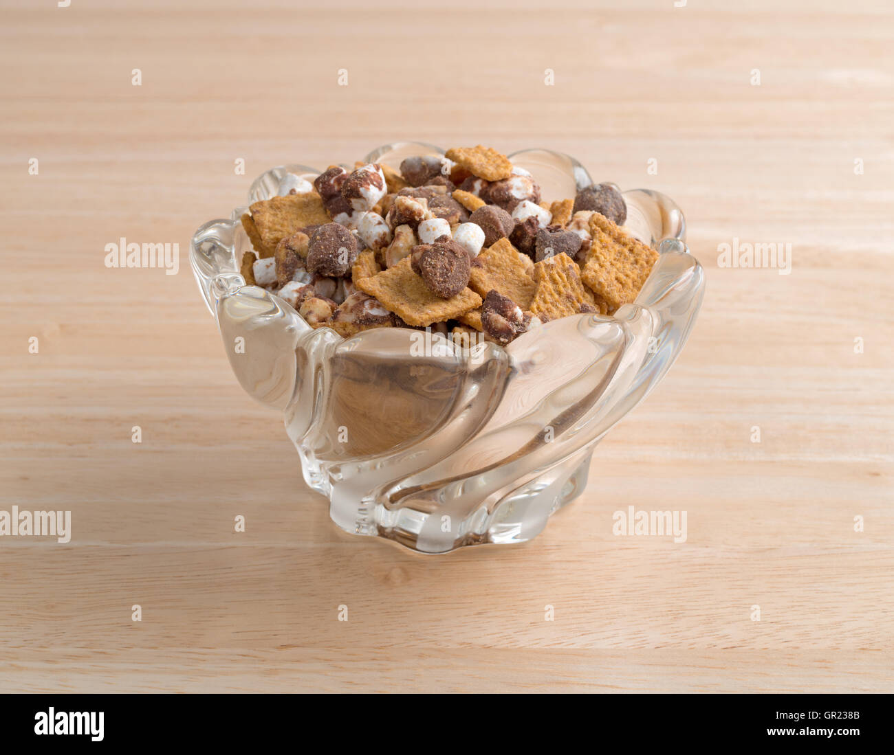 Smores candy mixture in a glass bowl on a wood table Stock Photo - Alamy