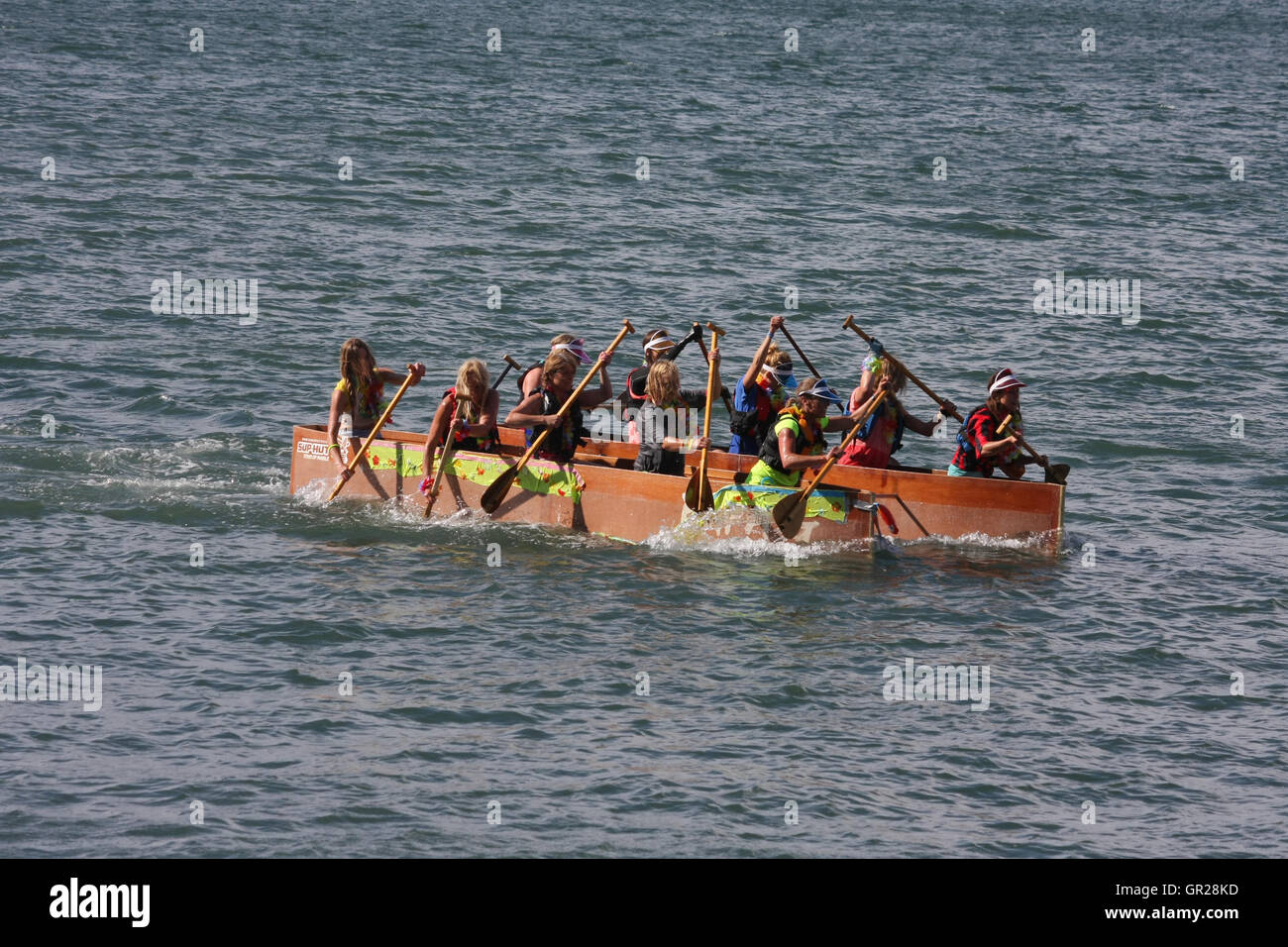 Raft race off Swansea Stock Photo - Alamy