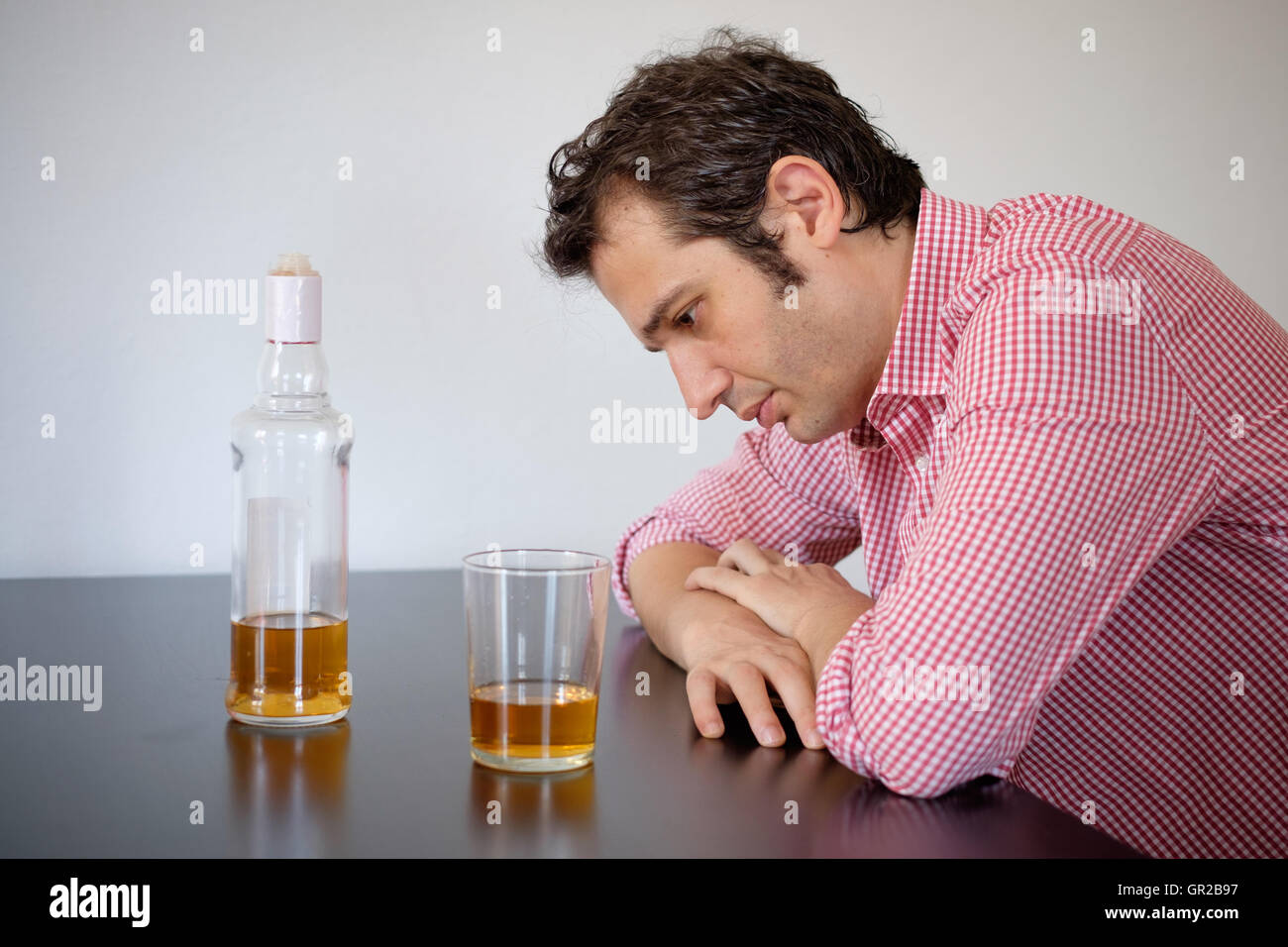 Sad man alcohol hi-res stock photography and images - Alamy