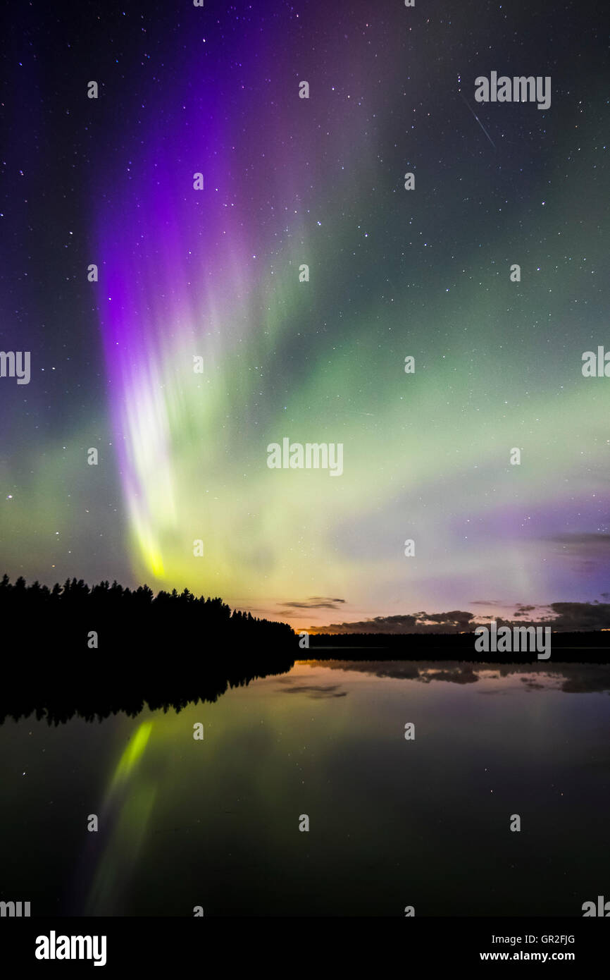 Northern Lights over a lake in Vaala, Finland Stock Photo - Alamy