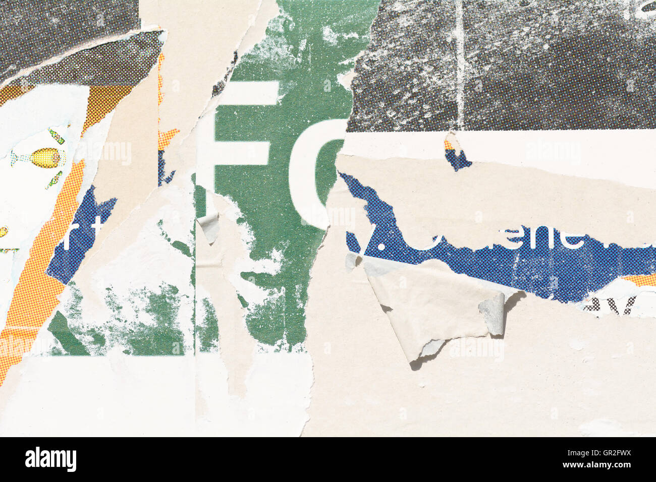 Layers of peeling advertising posters on billboard Stock Photo - Alamy