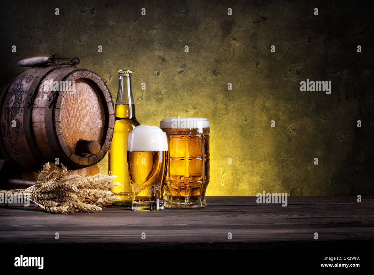 Still Life with beer on dark background Stock Photo - Alamy