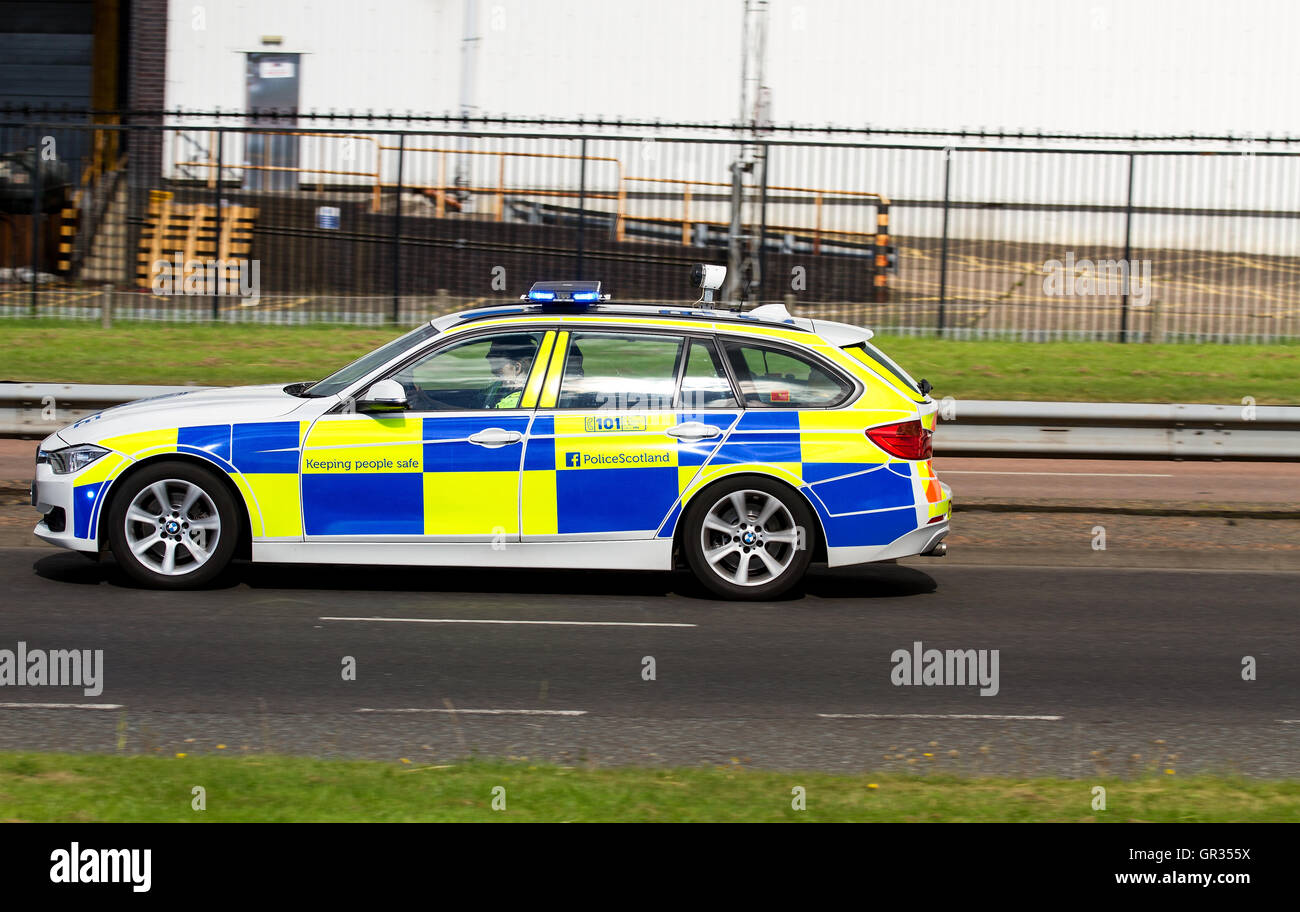 A Police Scotland BMW police car speeding in response to an incident ...