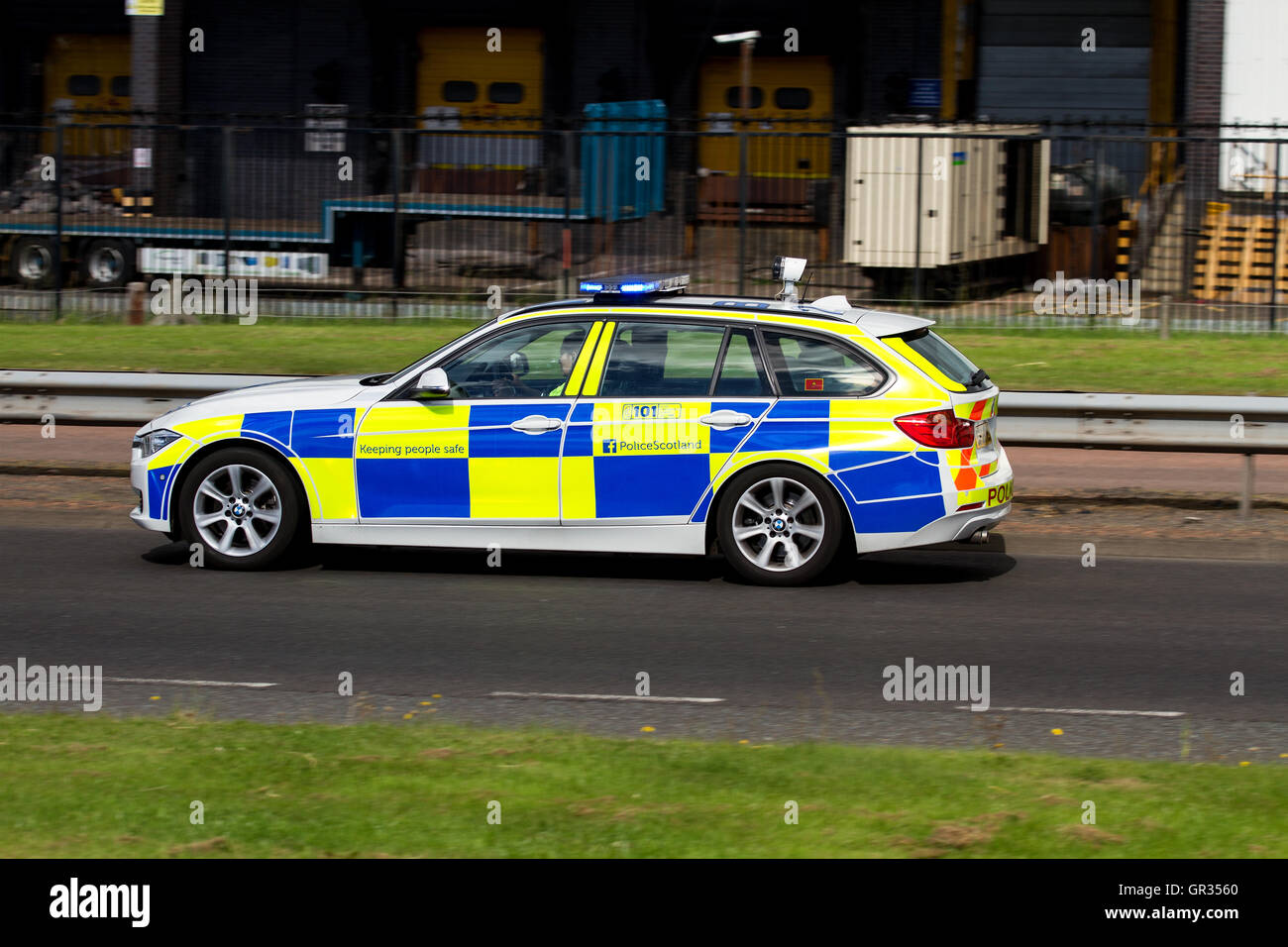 A Police Scotland BMW police car speeding in response to an incident ...
