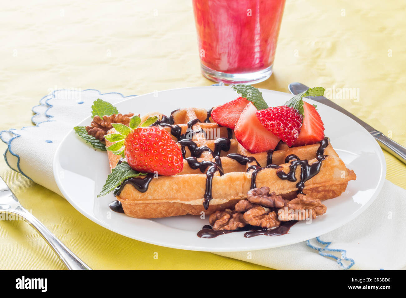 Closeup of fresh waffle with strawberry milkshake Stock Photo - Alamy