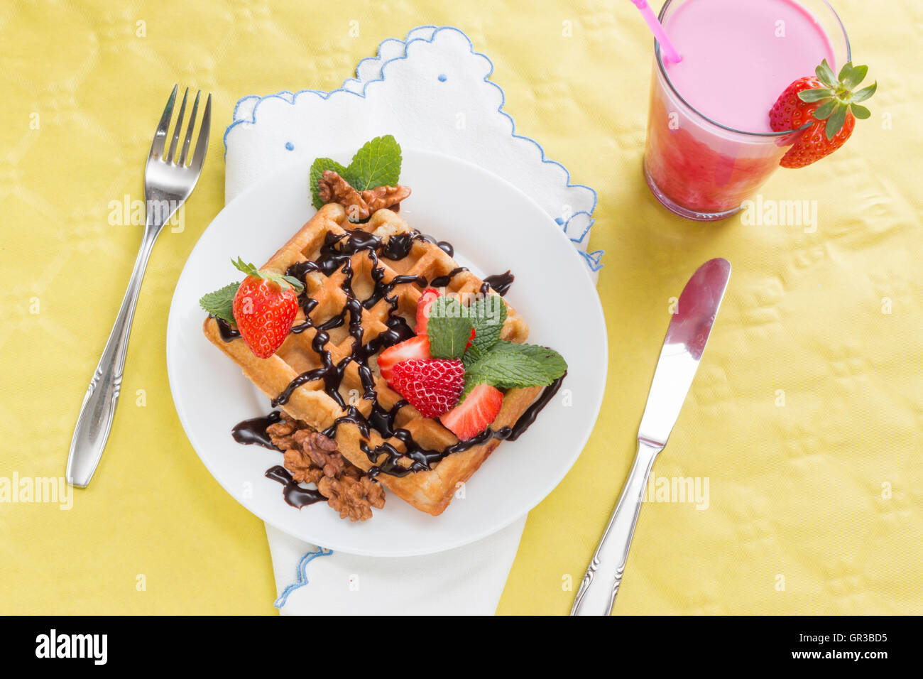 Closeup of fresh waffle with strawberry milkshake Stock Photo - Alamy