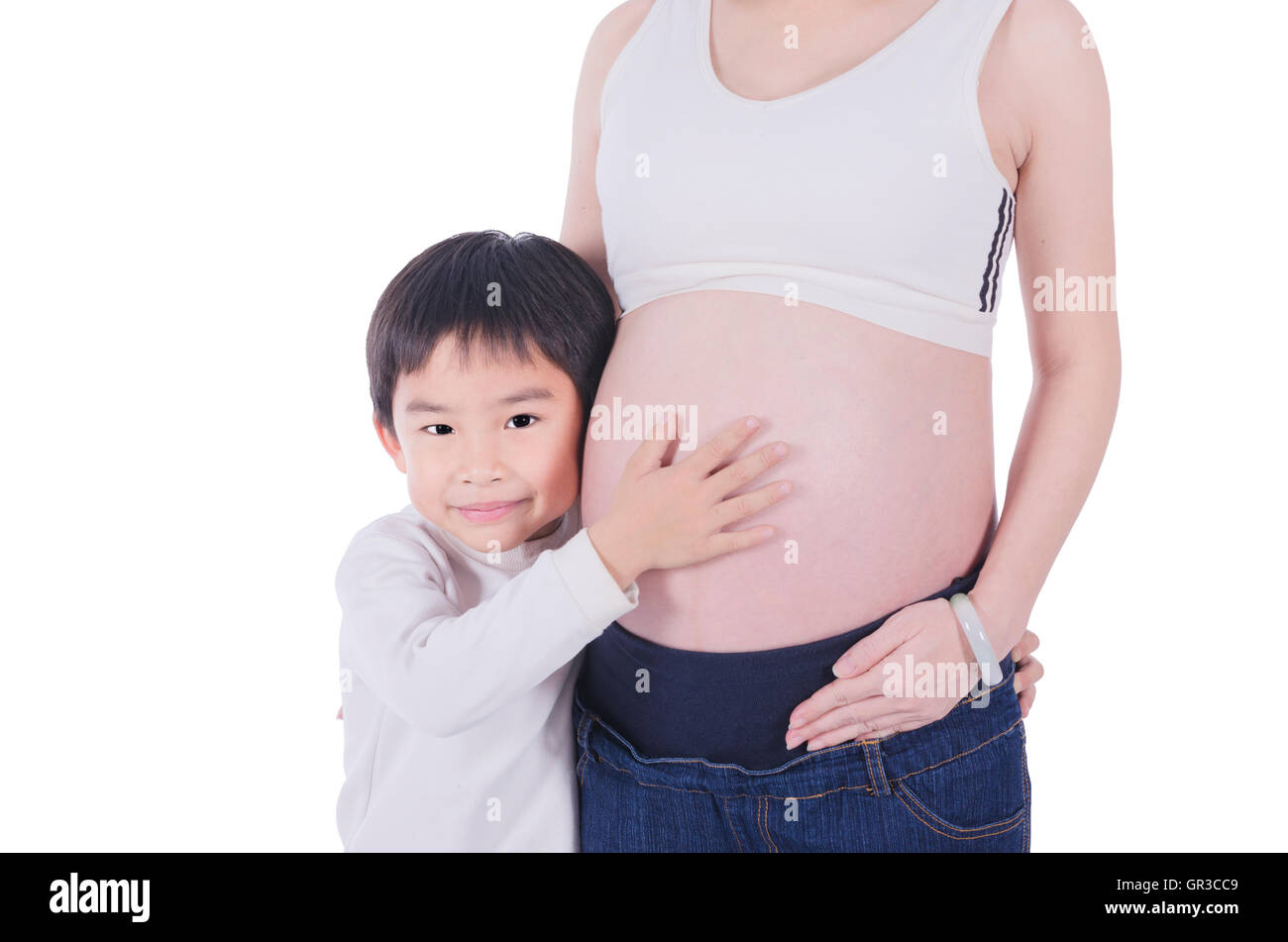 Cute boy expecting newborn Stock Photo - Alamy