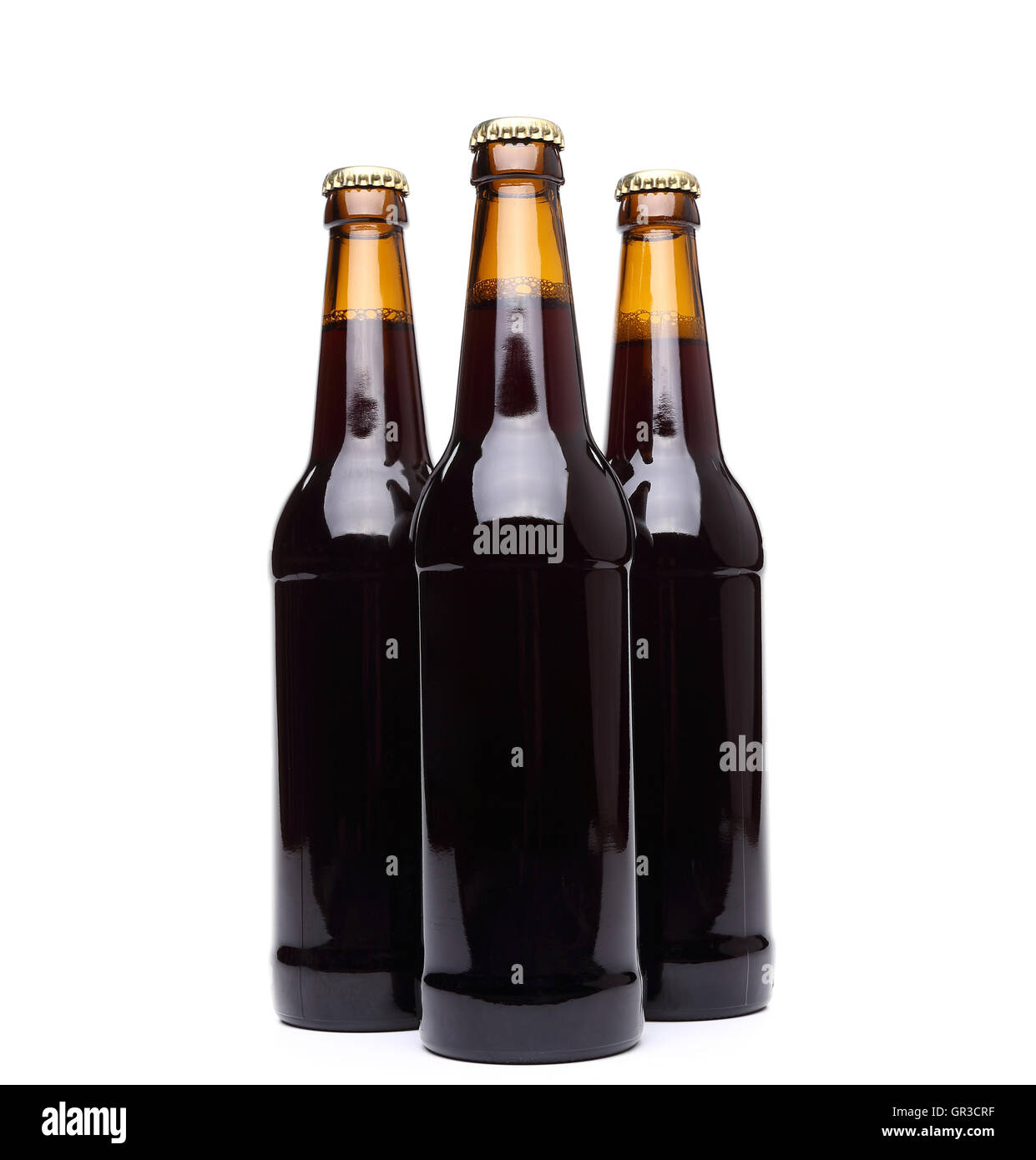 Three bottles of beer on white background Stock Photo - Alamy