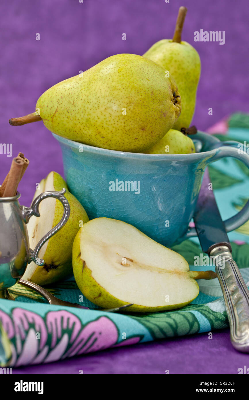 Vintage cup with fresh pears Stock Photo - Alamy
