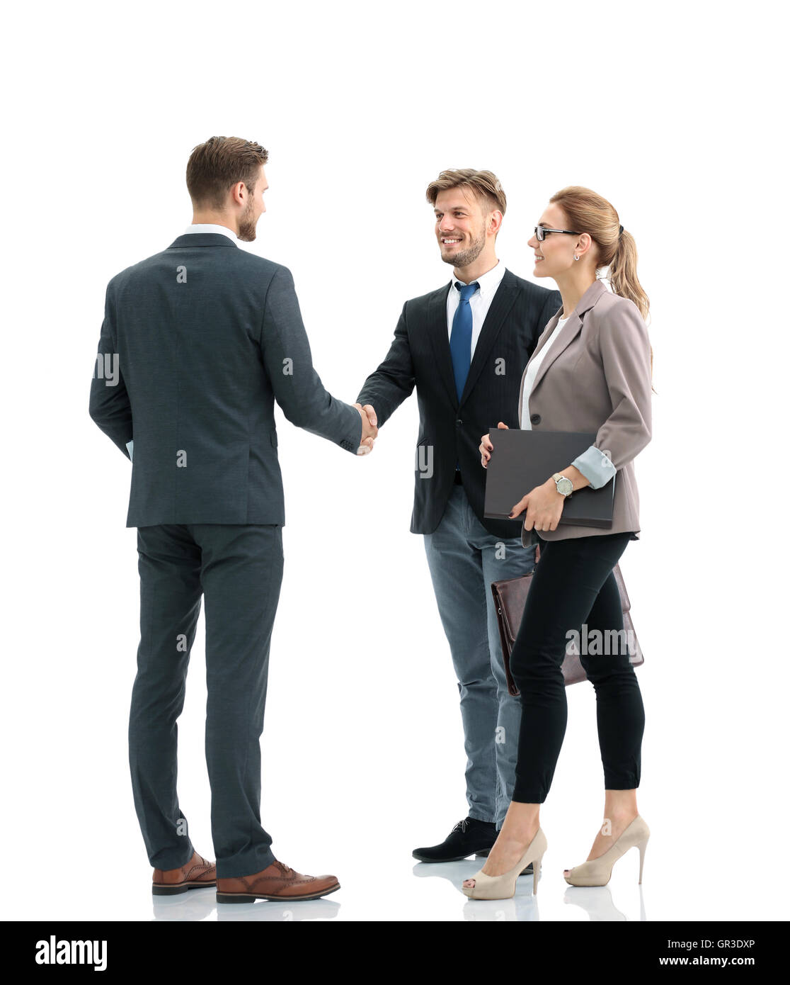Business people shaking hands during a meeting Stock Photo - Alamy