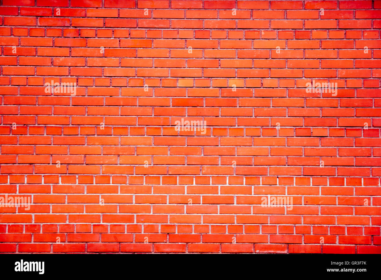 bright brick wall as the background of the small bricks Stock Photo - Alamy
