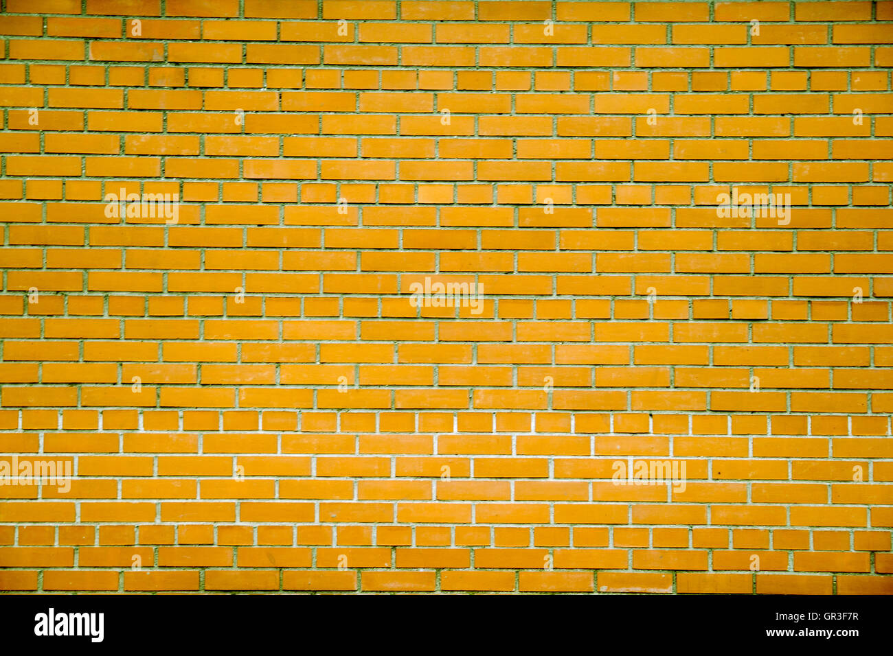 bright brick wall as the background of the small bricks Stock Photo - Alamy