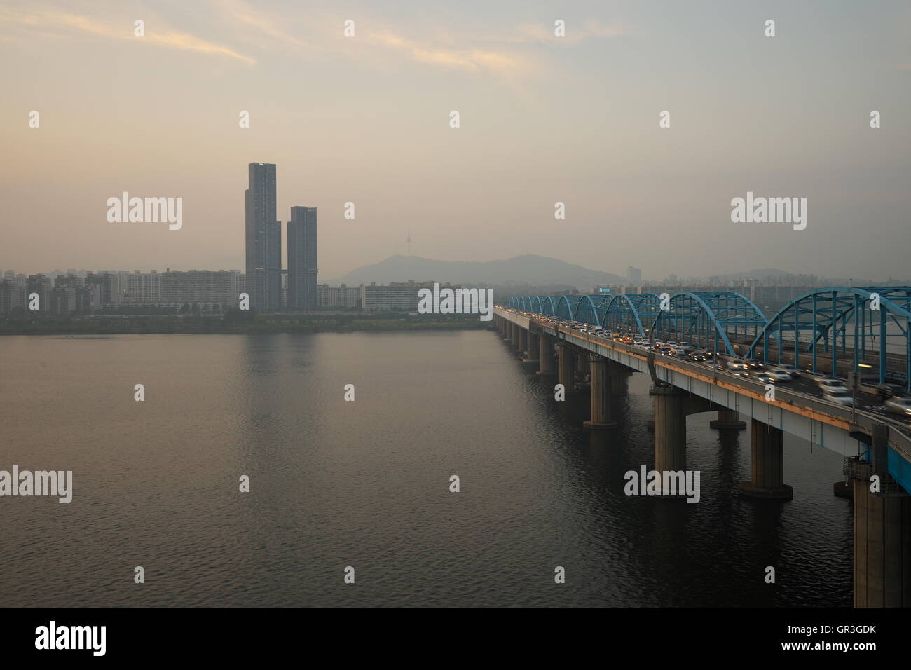 Evening view of Dongjak Bridge and N Seoul Tower over Han River ...
