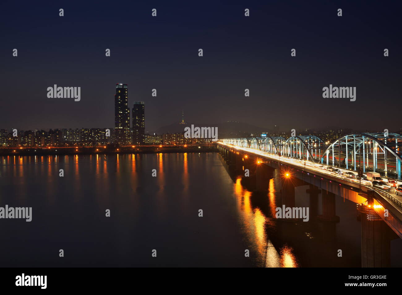 Evening view of Dongjak Bridge and N Seoul Tower over Han River ...