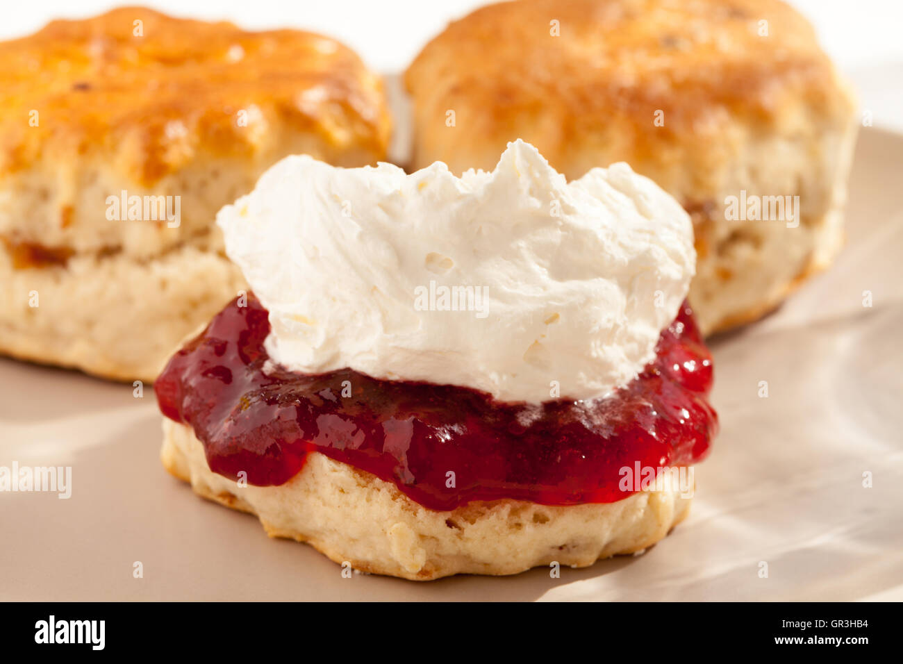 Scone, cream and jam Stock Photo - Alamy