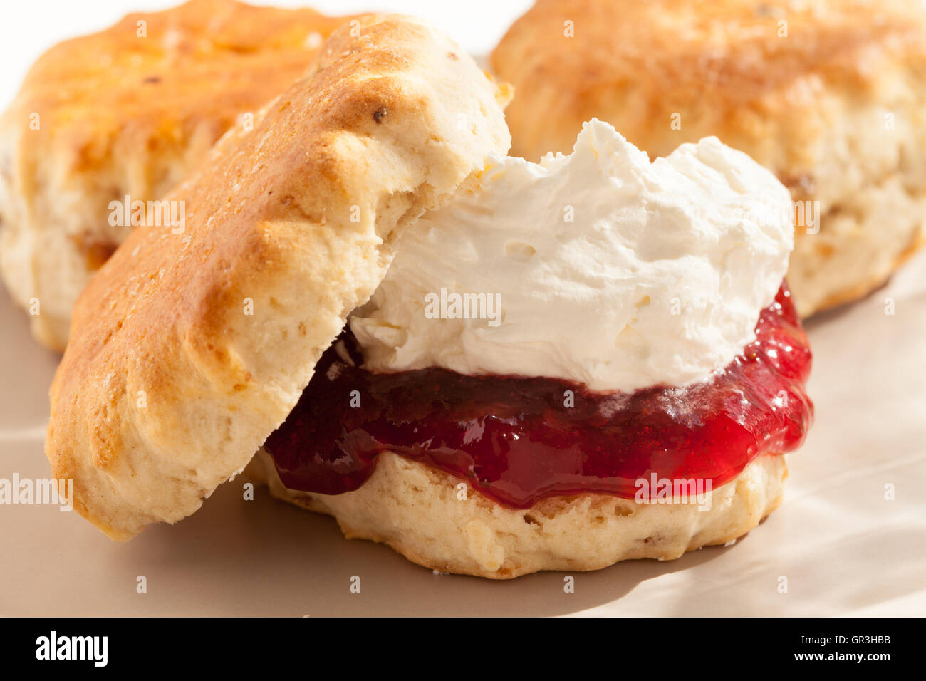 Scone, cream and jam Stock Photo - Alamy