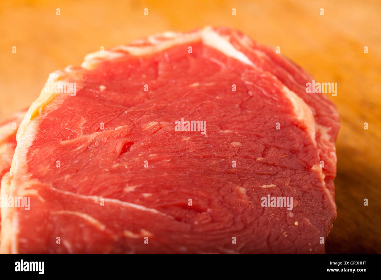 Two Beef Sirloin Steaks on Wooden Board Stock Photo - Alamy