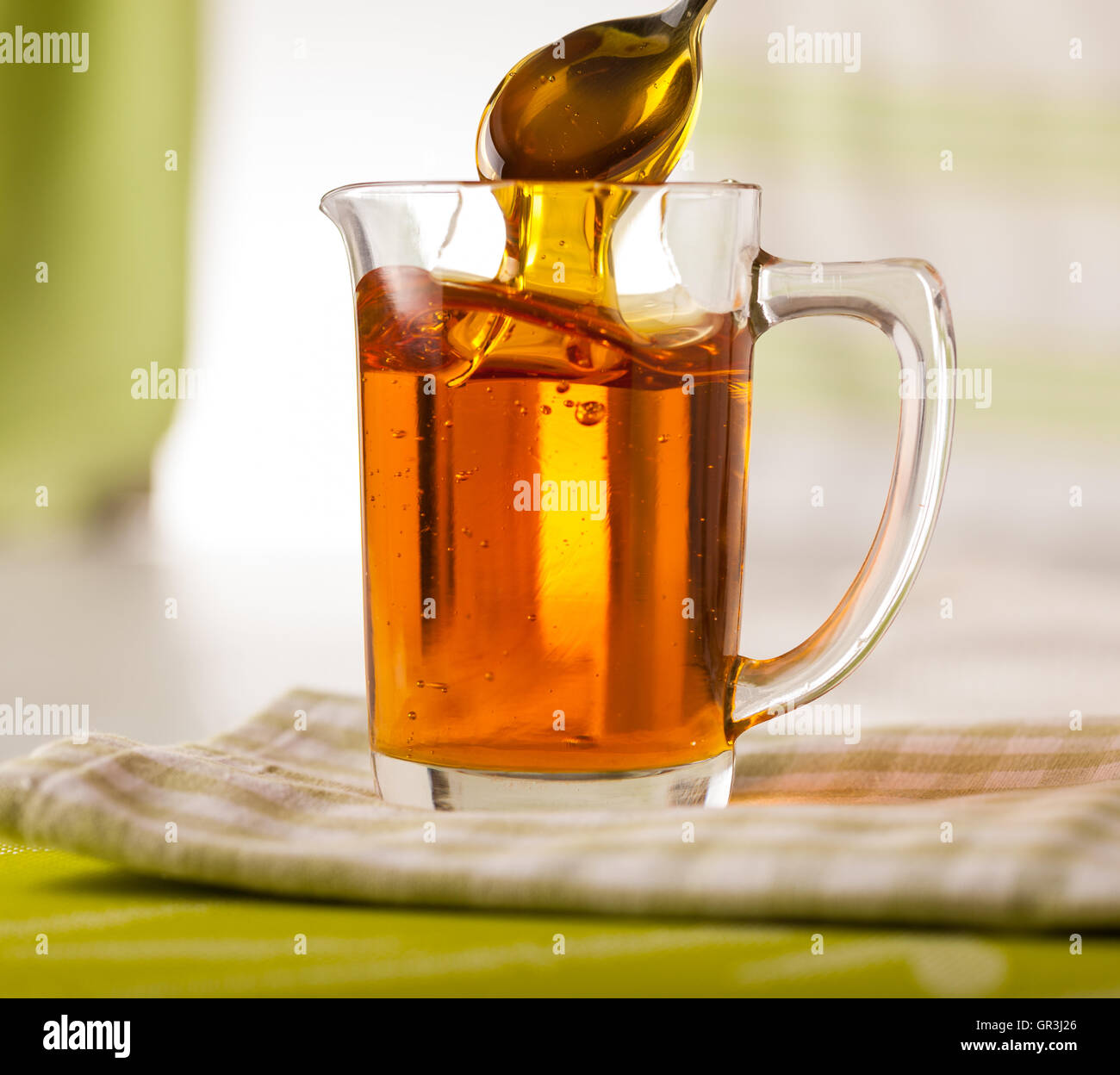 Gold syrup hi-res stock photography and images - Alamy
