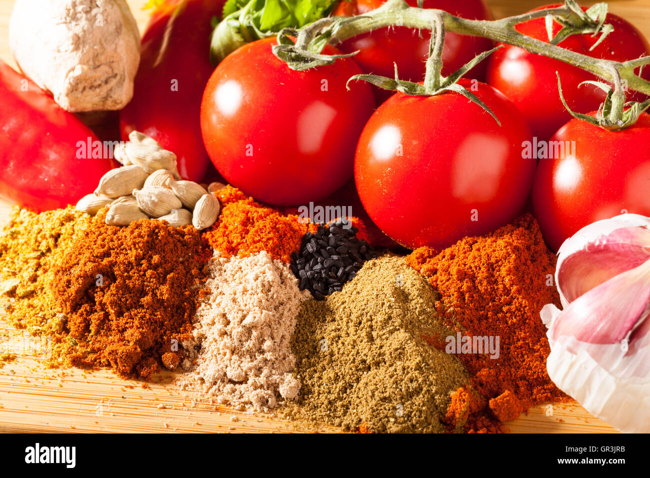 Tomato and spices ingredients for Indian cooking Stock Photo - Alamy