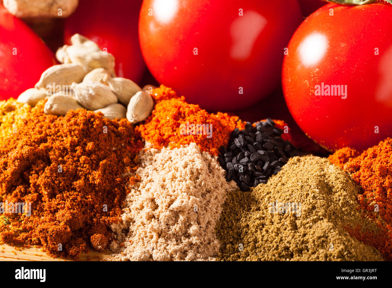 Tomato and spices ingredients for Indian cooking Stock Photo - Alamy