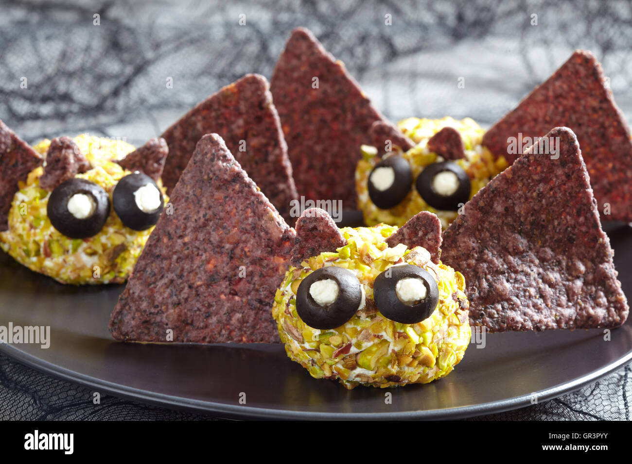 Cute bat cheese ball for Halloween party Stock Photo - Alamy