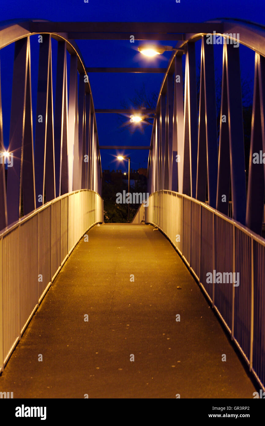 Footbridge in the night Stock Photo - Alamy