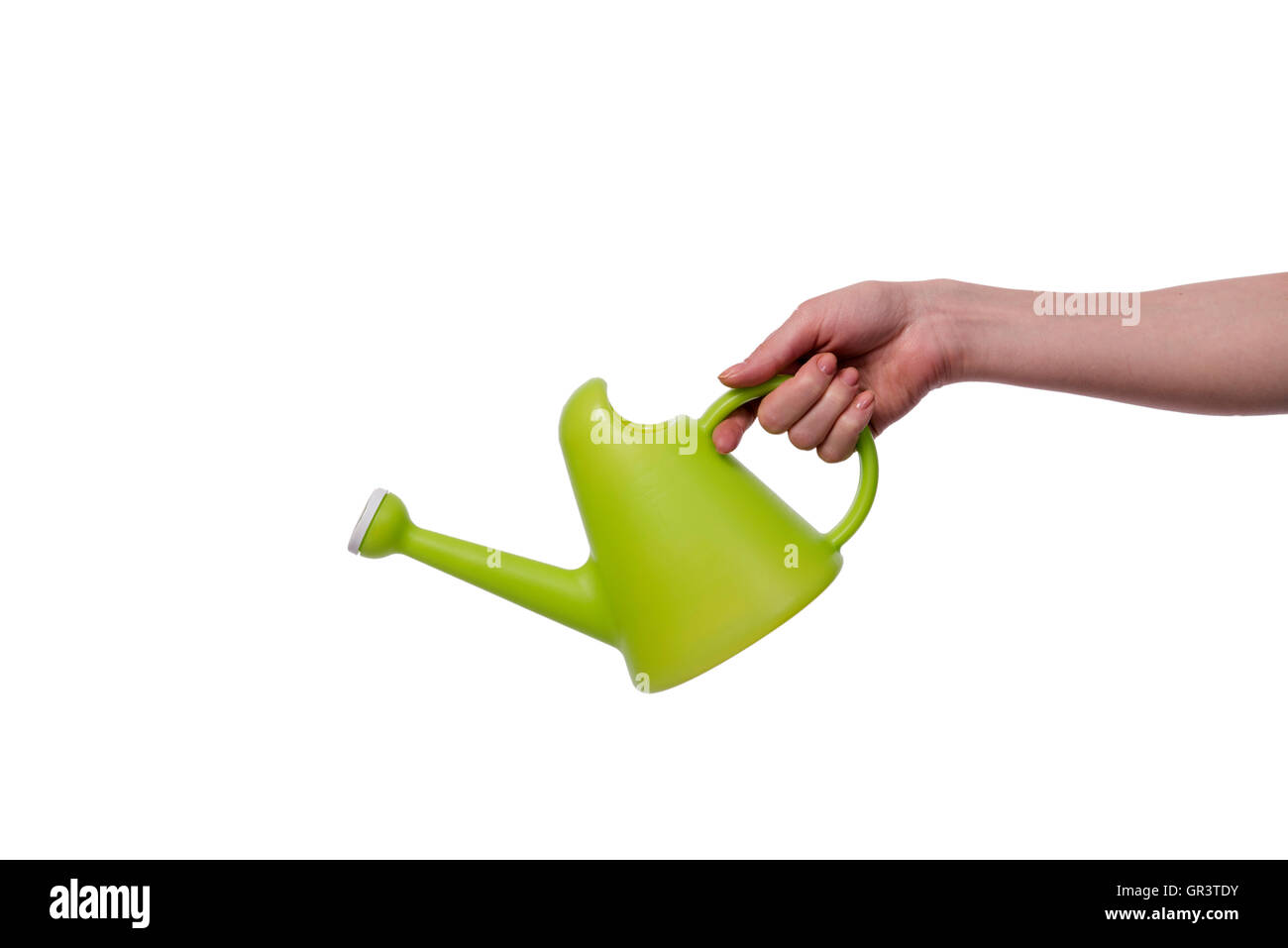 Hand holding watering can isolated on white Stock Photo - Alamy