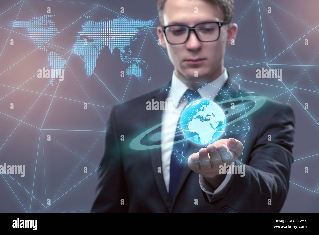 Businessman in global business concept Stock Photo - Alamy