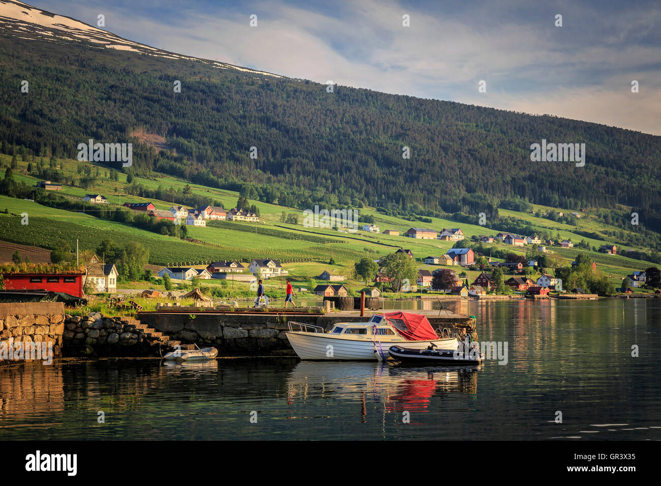 Dusk with reflections in the fjord at Innvik in Norway Stock Photo - Alamy