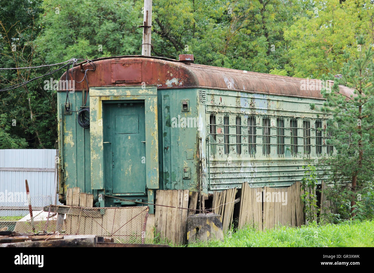 old green train car with orange roof Stock Photo - Alamy