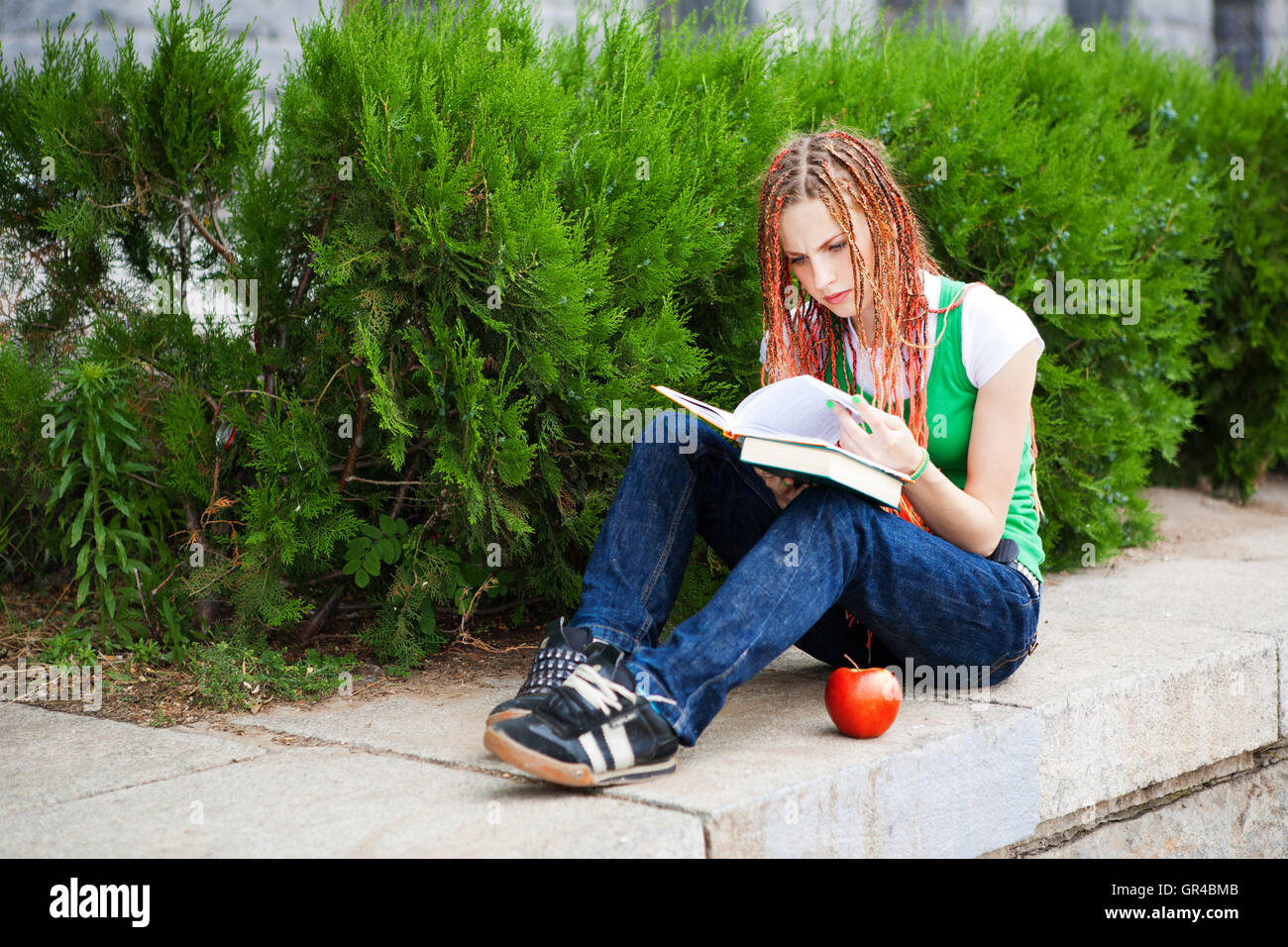 student reading book Stock Photo - Alamy