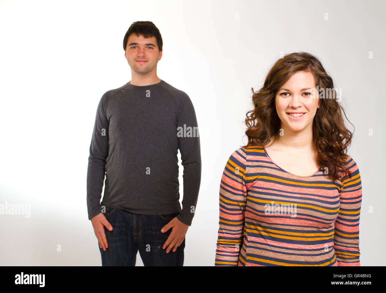 Attractive Couple Isolated in Studio Stock Photo - Alamy