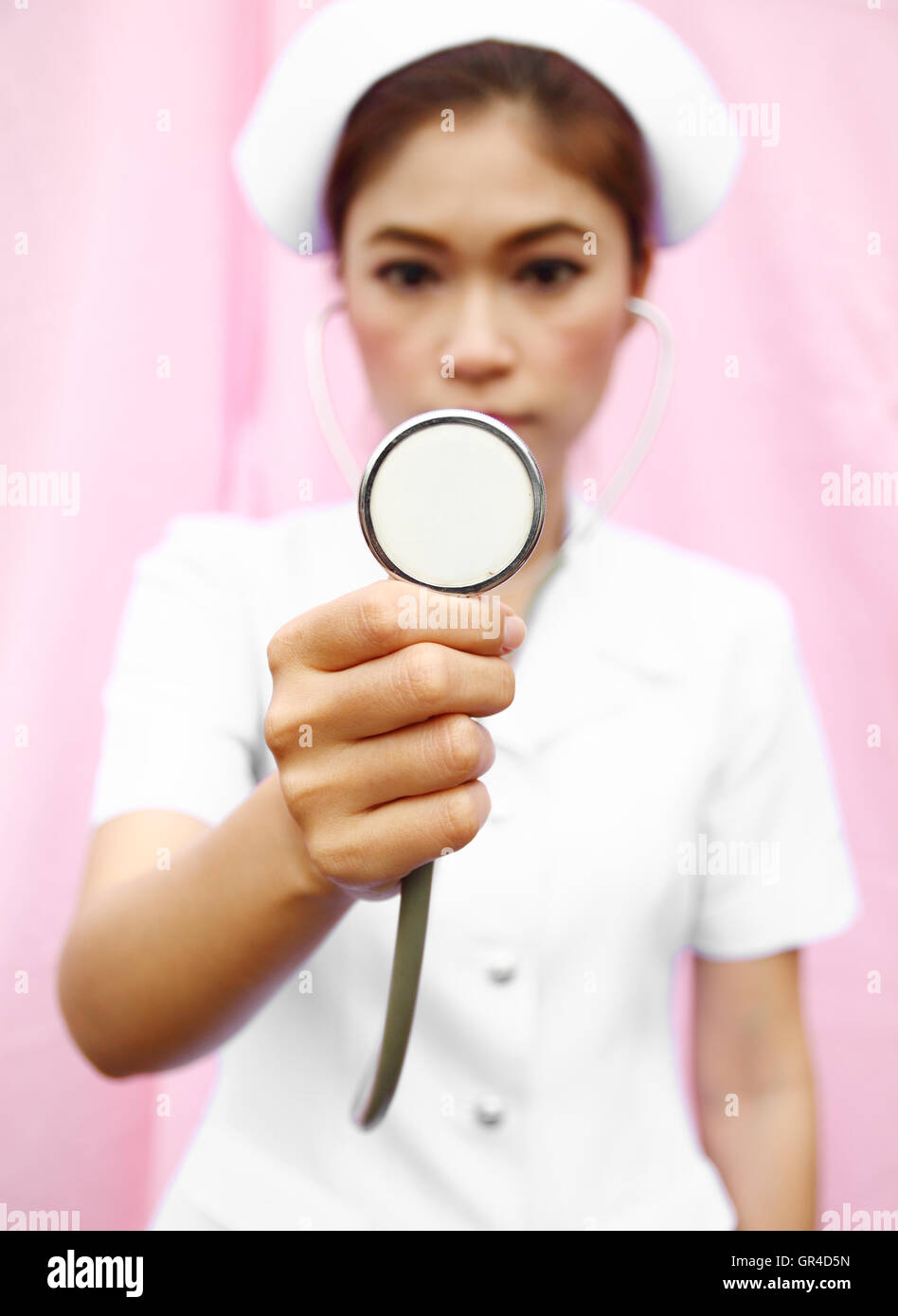 Young nurse with stethoscope Stock Photo - Alamy