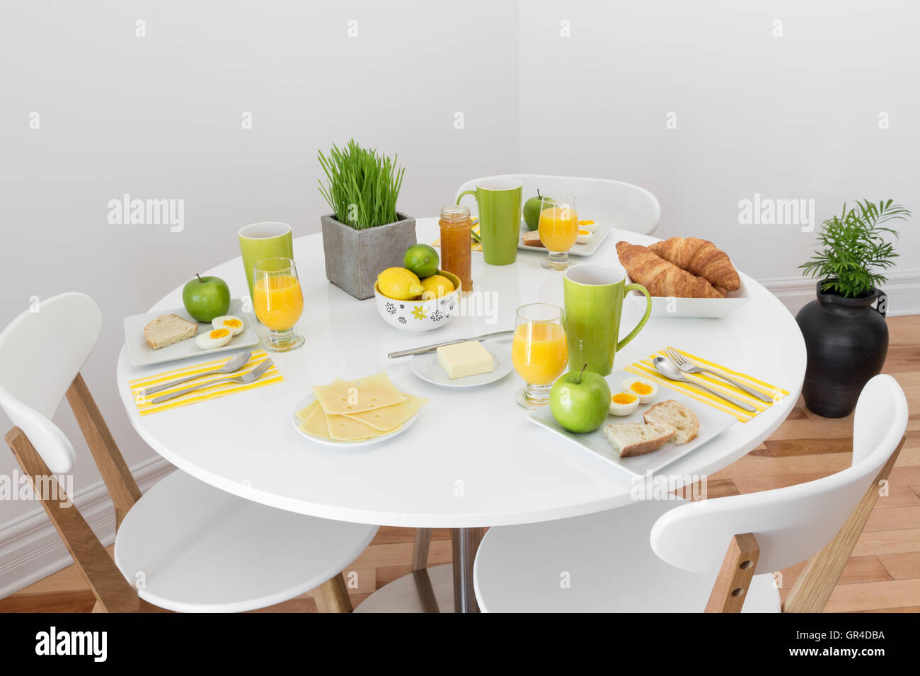 Round table with tasty breakfast Stock Photo - Alamy