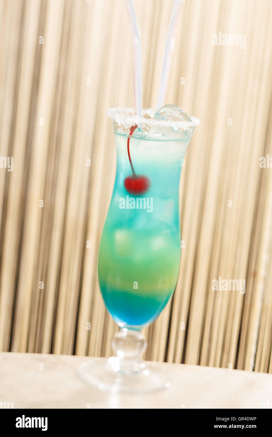 blue cocktail with cherry Stock Photo - Alamy