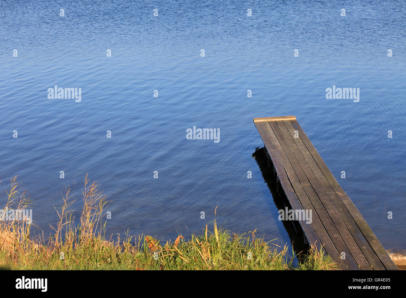 jetty in the lake Stock Photo - Alamy
