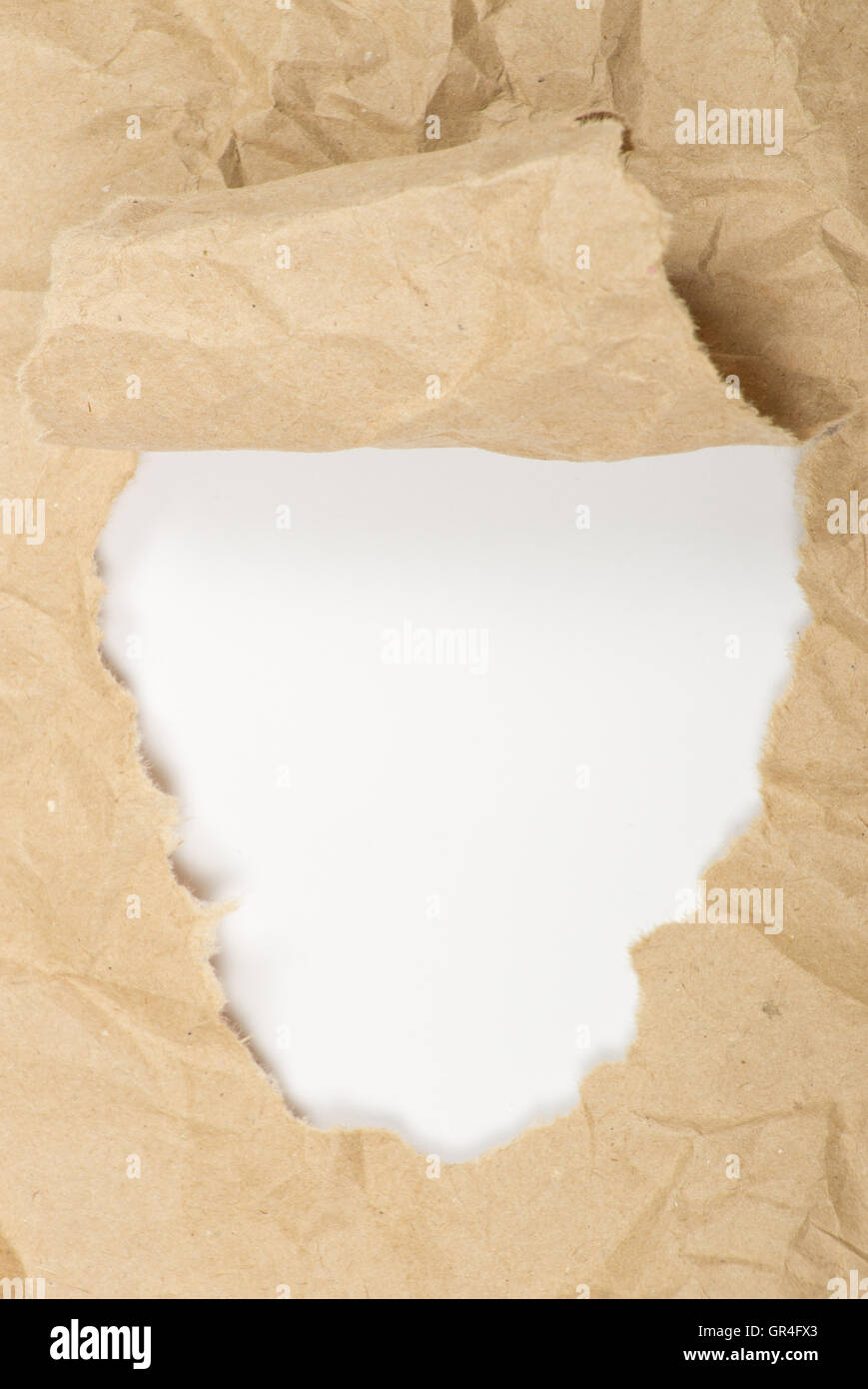 ripped white paper against a white background Stock Photo - Alamy