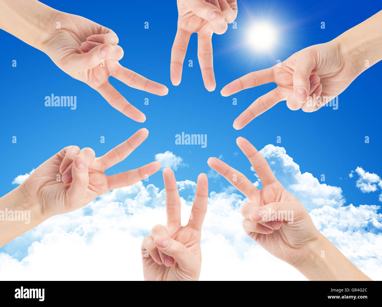 Hands of teamwork , forming the star shape Stock Photo - Alamy