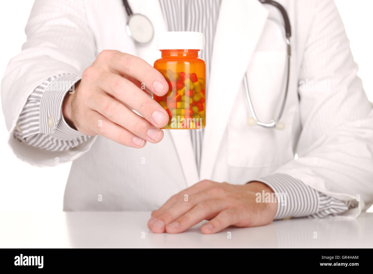 Doctor With Medication in Prescription Bottles Stock Photo - Alamy