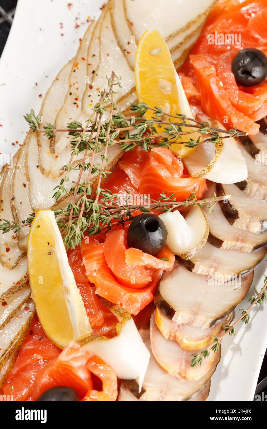 Fish delicacies on a festive table Stock Photo - Alamy