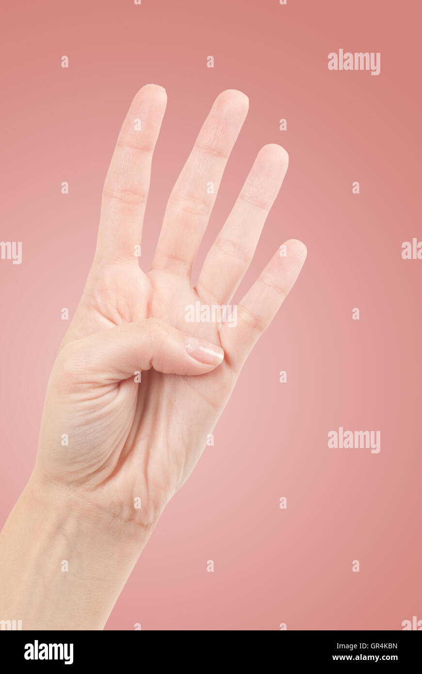 Hand Gesture - Number Four isolated on white Stock Photo - Alamy