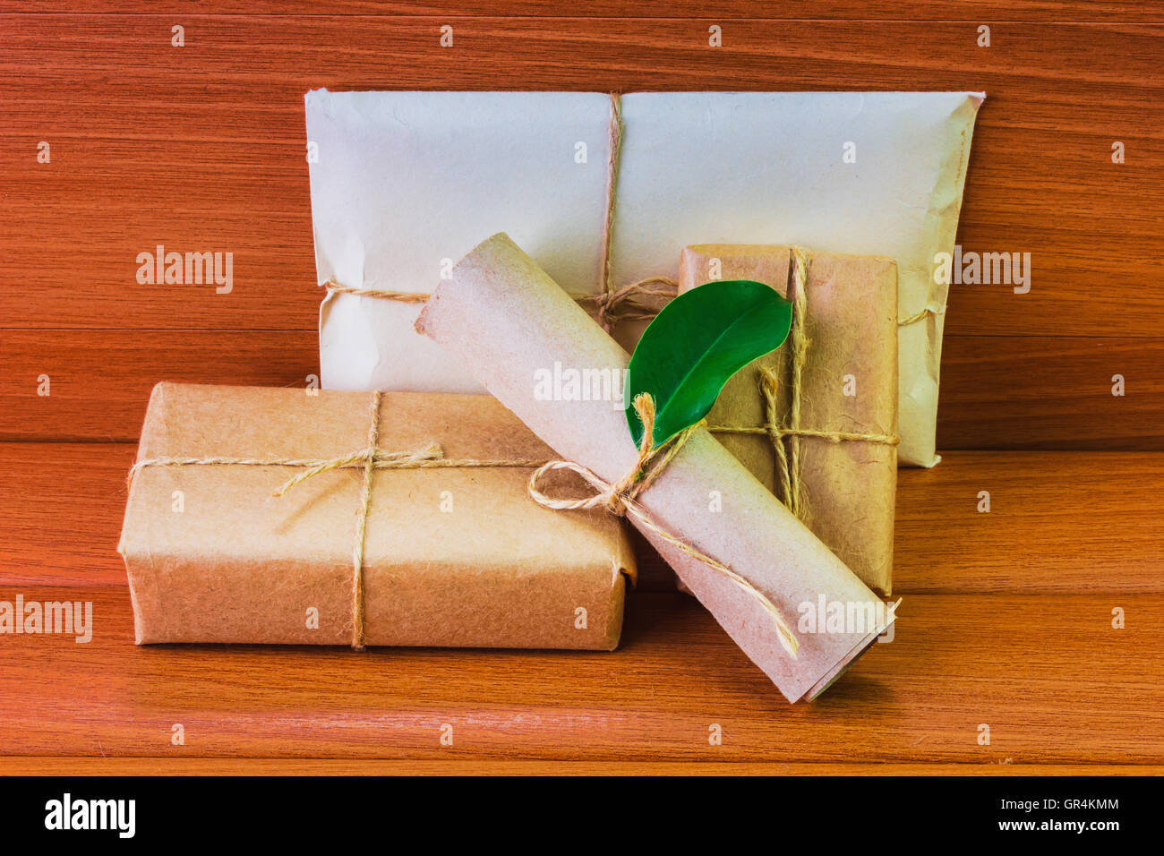 Postage on the background of an old board Stock Photo - Alamy